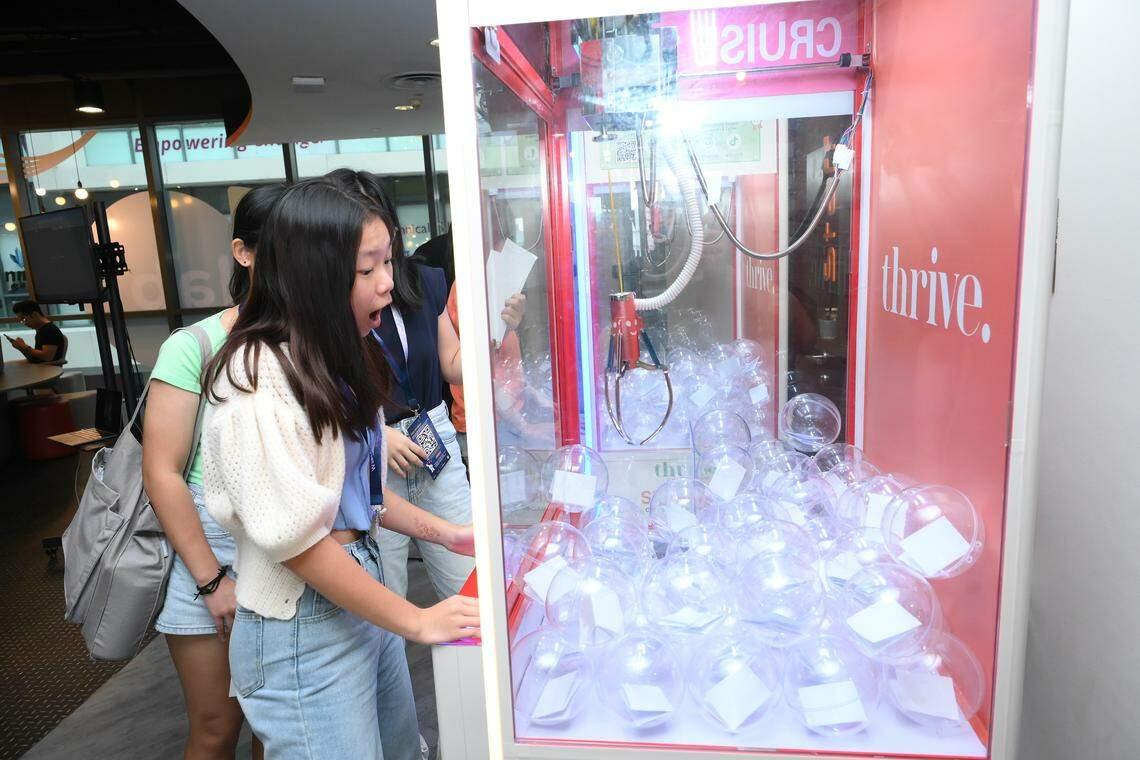 Students try a day in the life of a Thrive journalist at career fair ...